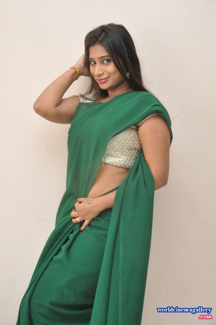 Mithuna Waliya Hot Navel in Green Saree Stills