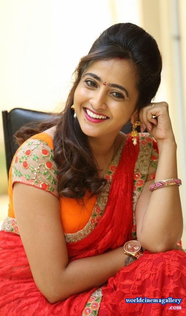 Anchor Lasya Latest Stills in Orange Saree