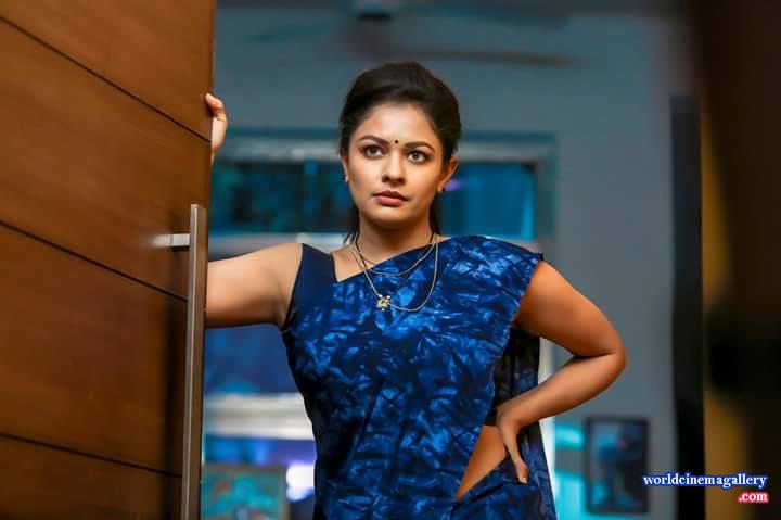 Pooja Kumar blue saree stills from PSV Garuda Vega
