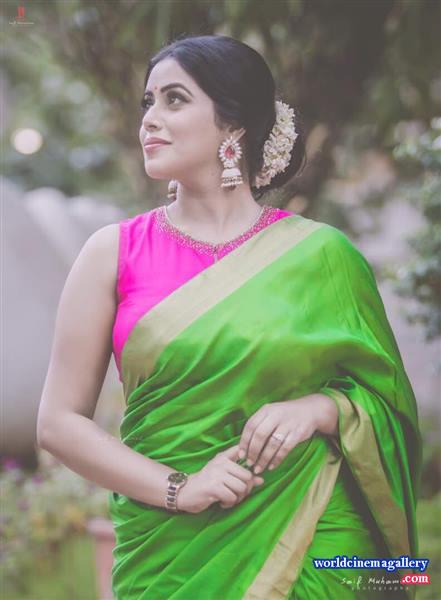 Poorna Stills in Red Saree