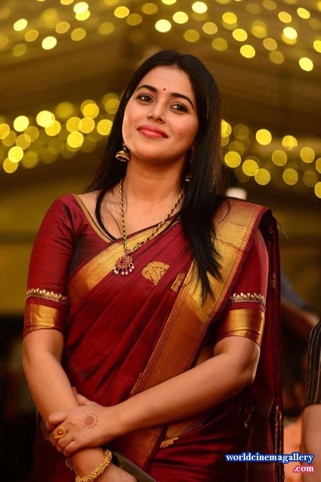 Poorna Stills in Red Saree
